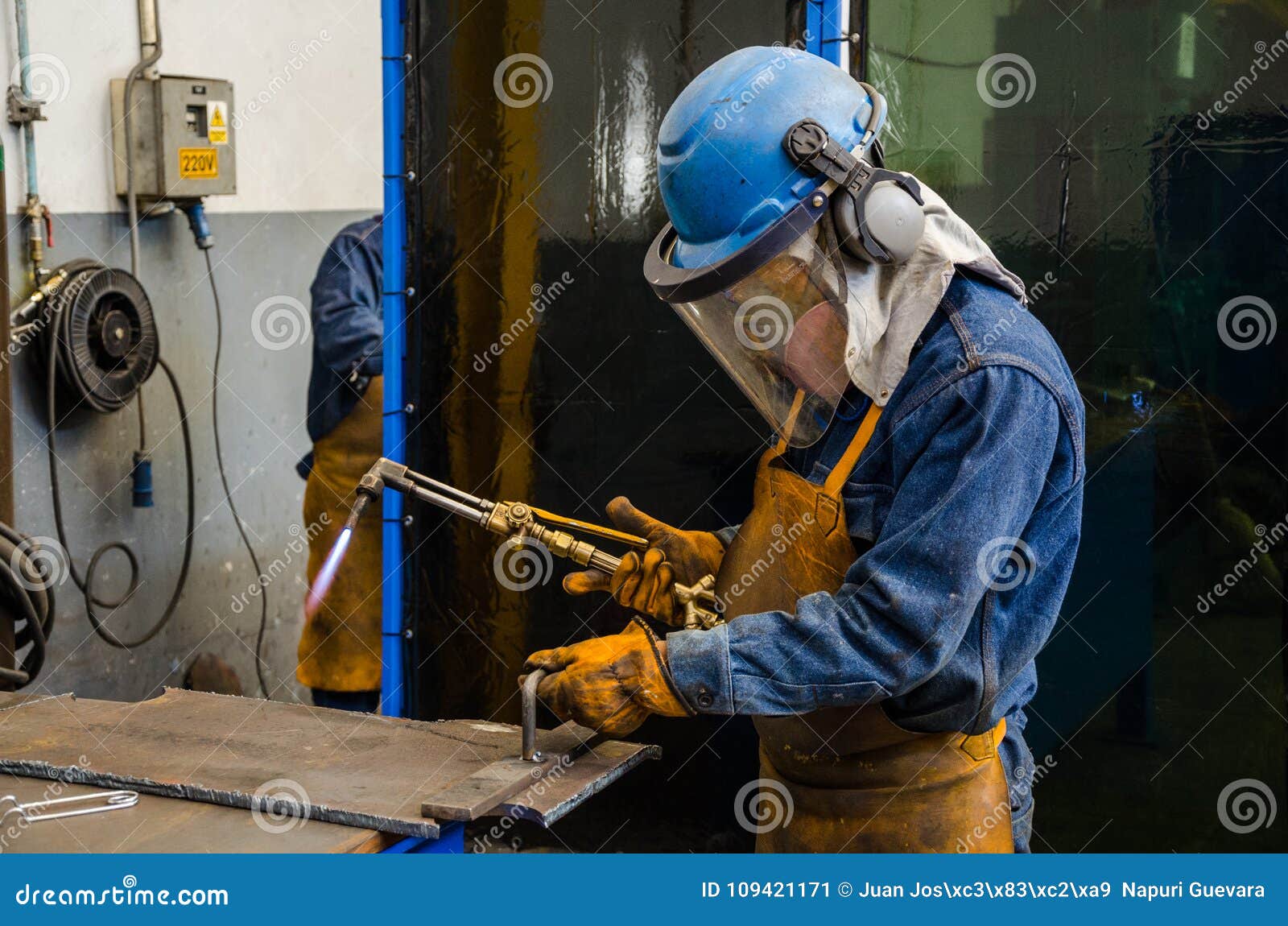Man cutting iron stock image. Image of rotation, occupation - 109421171