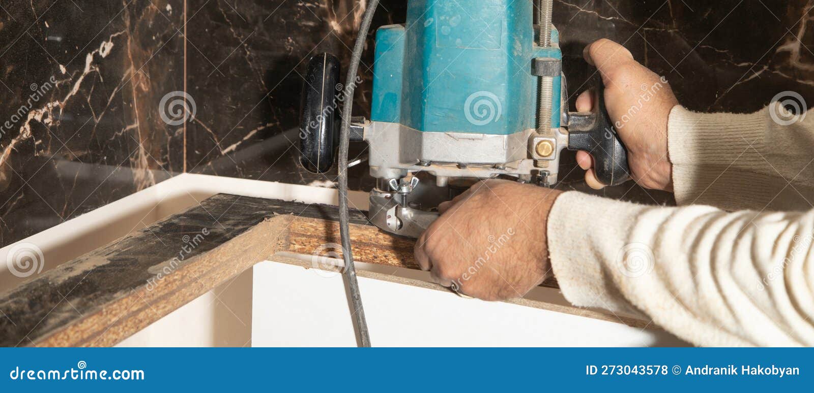 Worker Cutting Kitchen Countertop Using Electric Saw Stock Photo ...