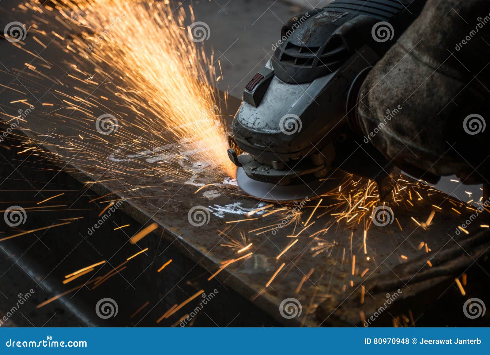 Worker Cutting Metal with Grinder.Spark while Grinding Iron Stock Photo ...