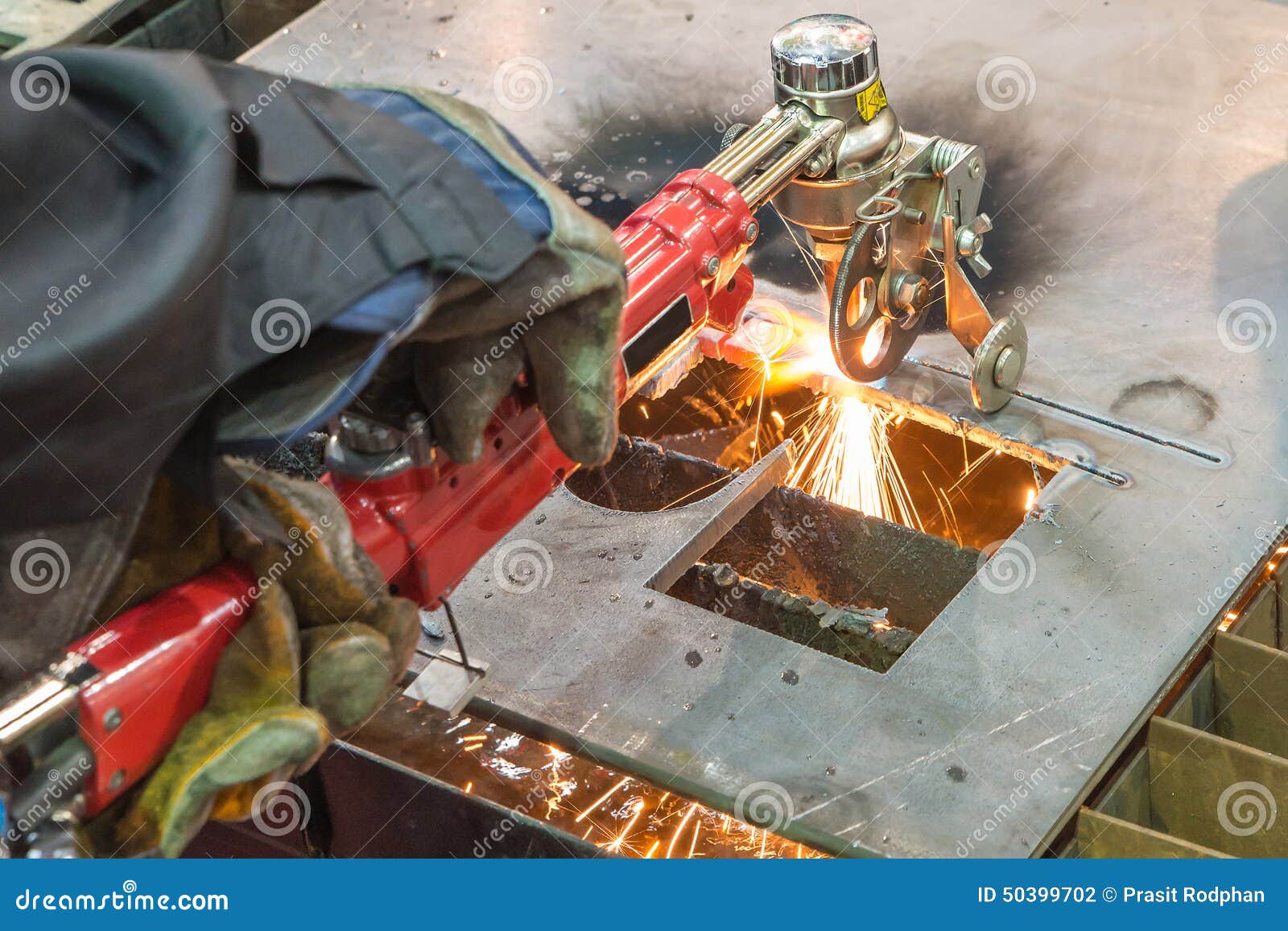 Worker Cutting Metal with Grinder. Sparks while Grinding Iron Stock ...