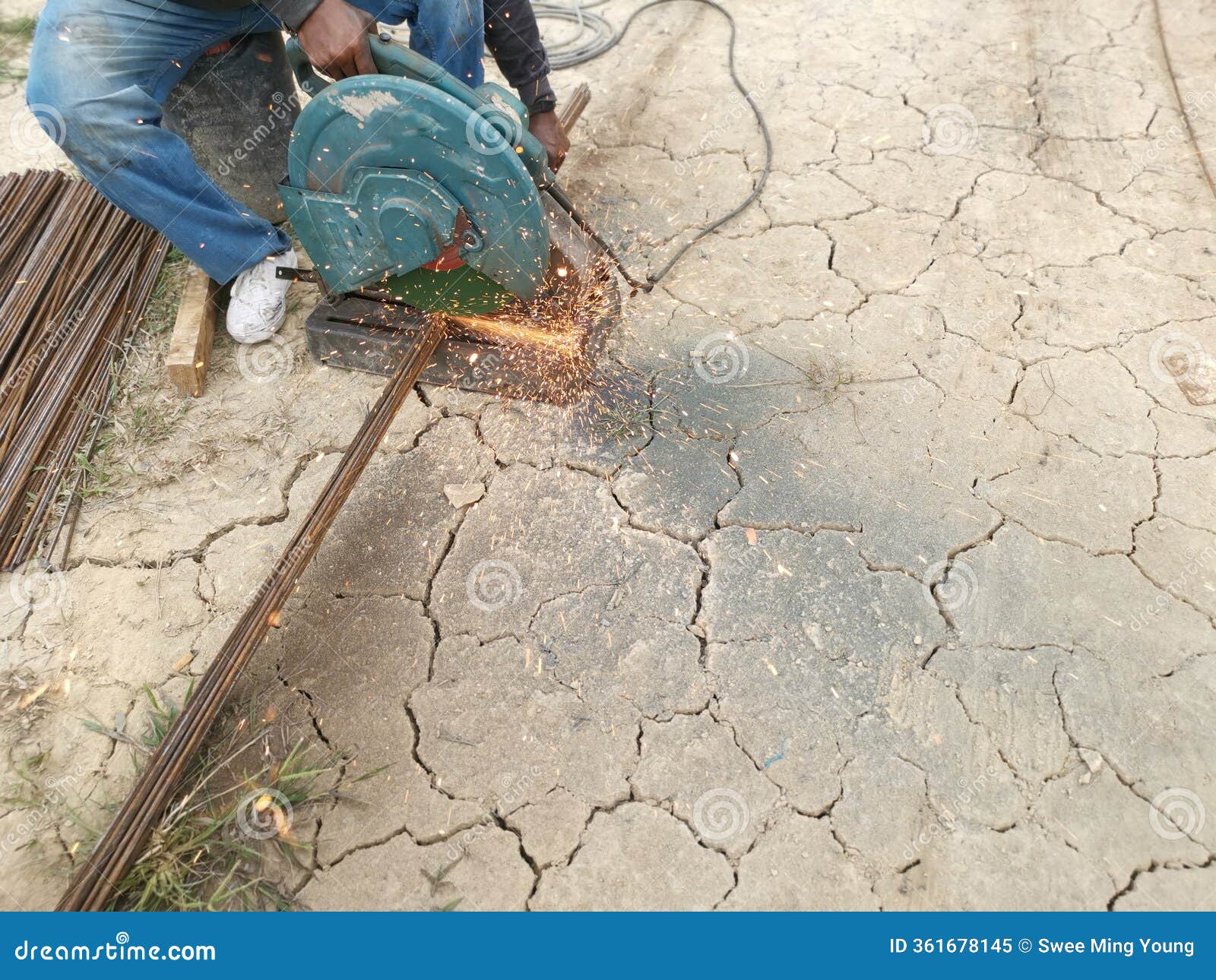 Worker Cutting Rebar Metal with the Iron Cutter Machine. Stock Image ...