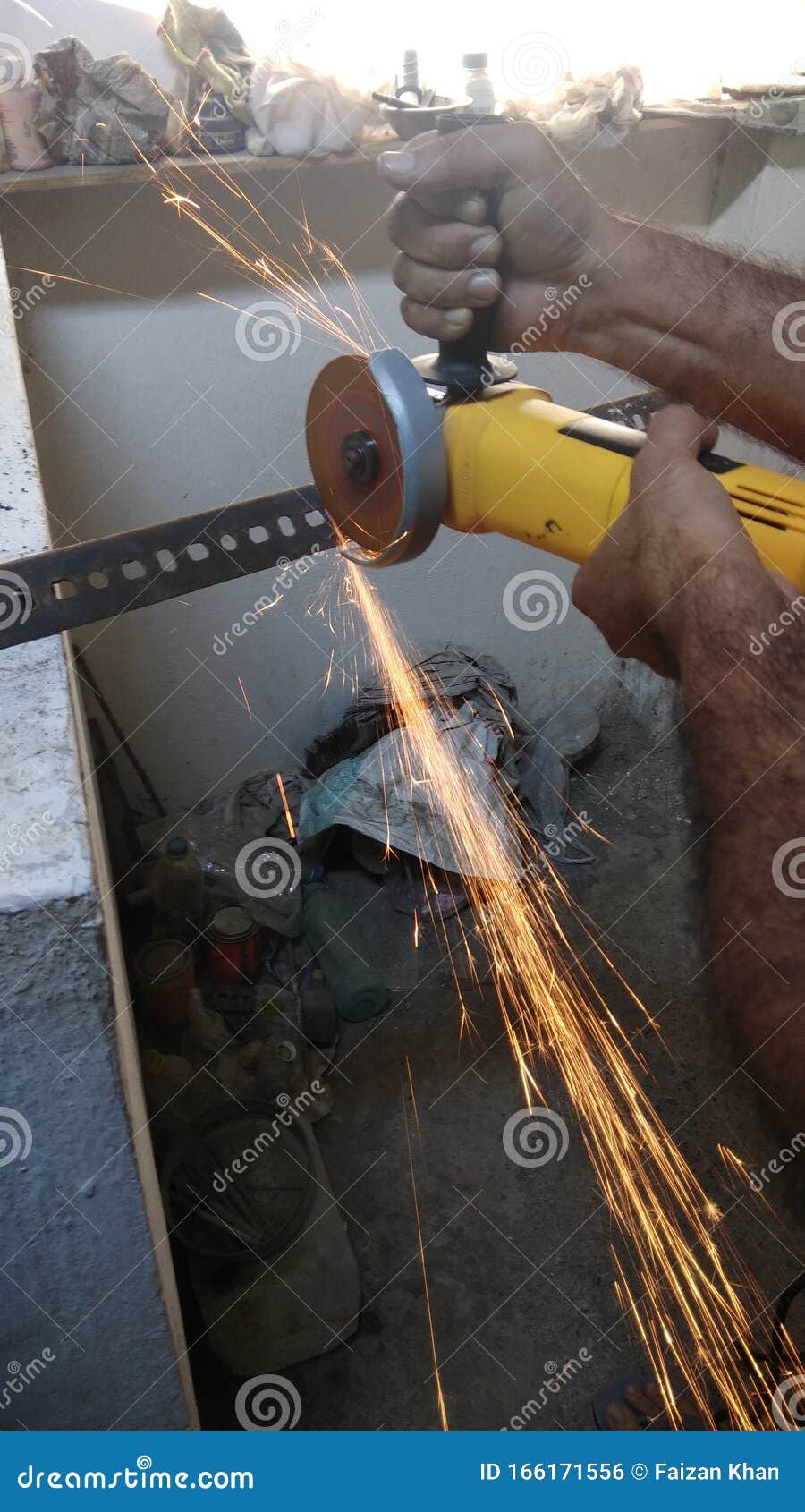 Worker Cutting Steel at a Construction Site Stock Photo - Image of ...
