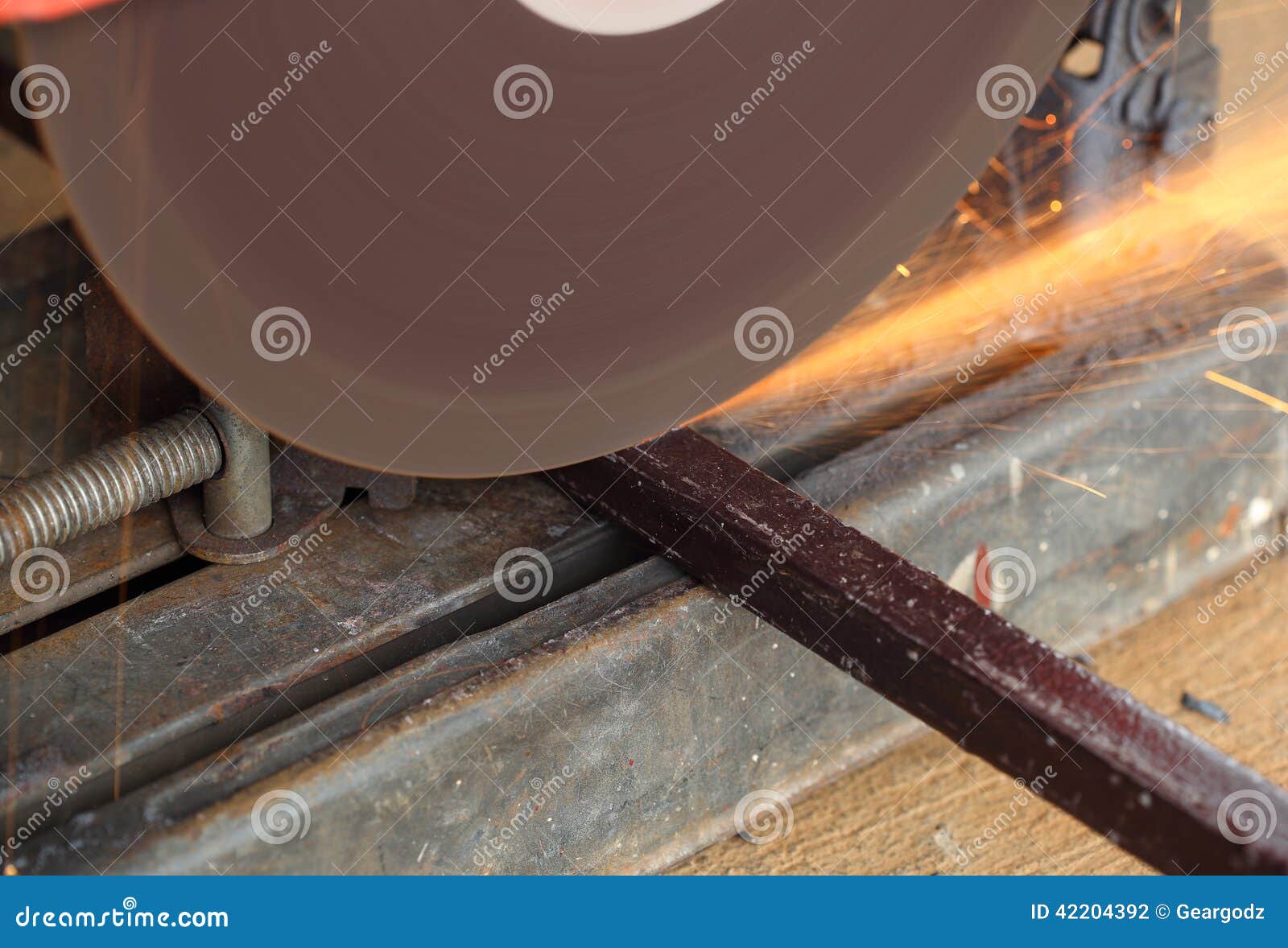 Worker cutting steel rod stock photo. Image of manufacture - 42204392