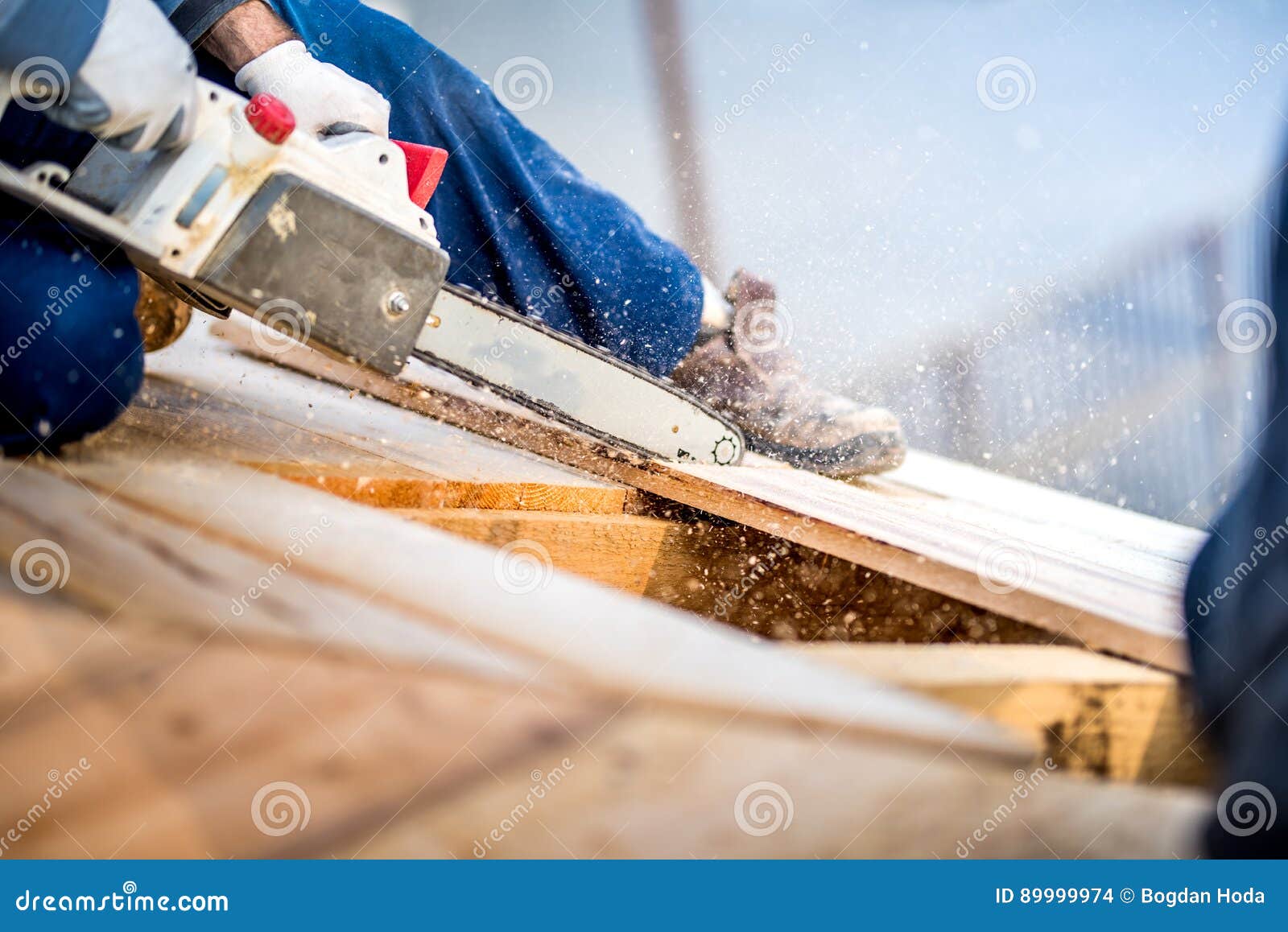 Worker Cutting Timber Planks Using Electrical Saw. Details of ...