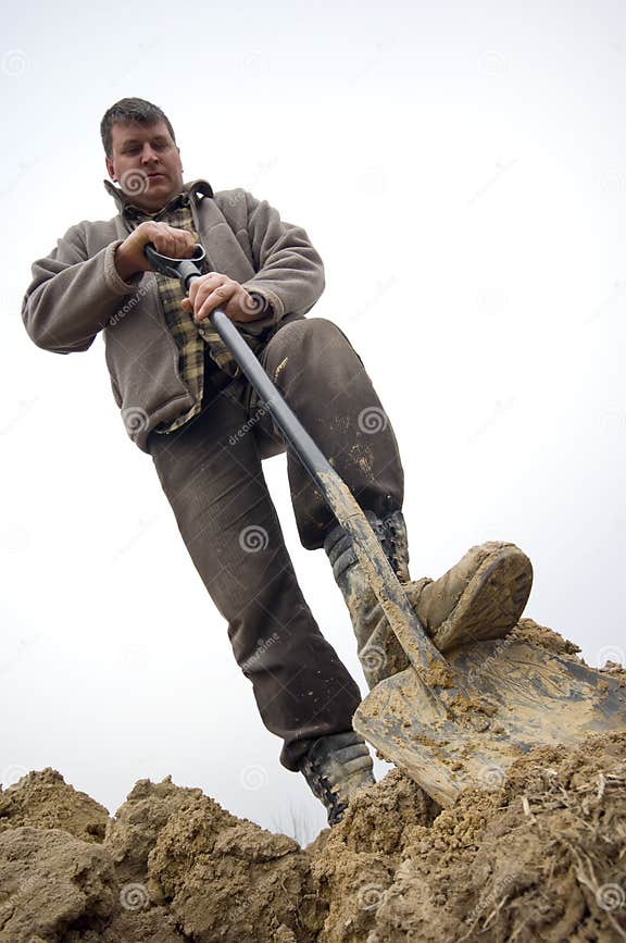 Worker Digging in the Ground Stock Image - Image of dirty, stuck: 5018557