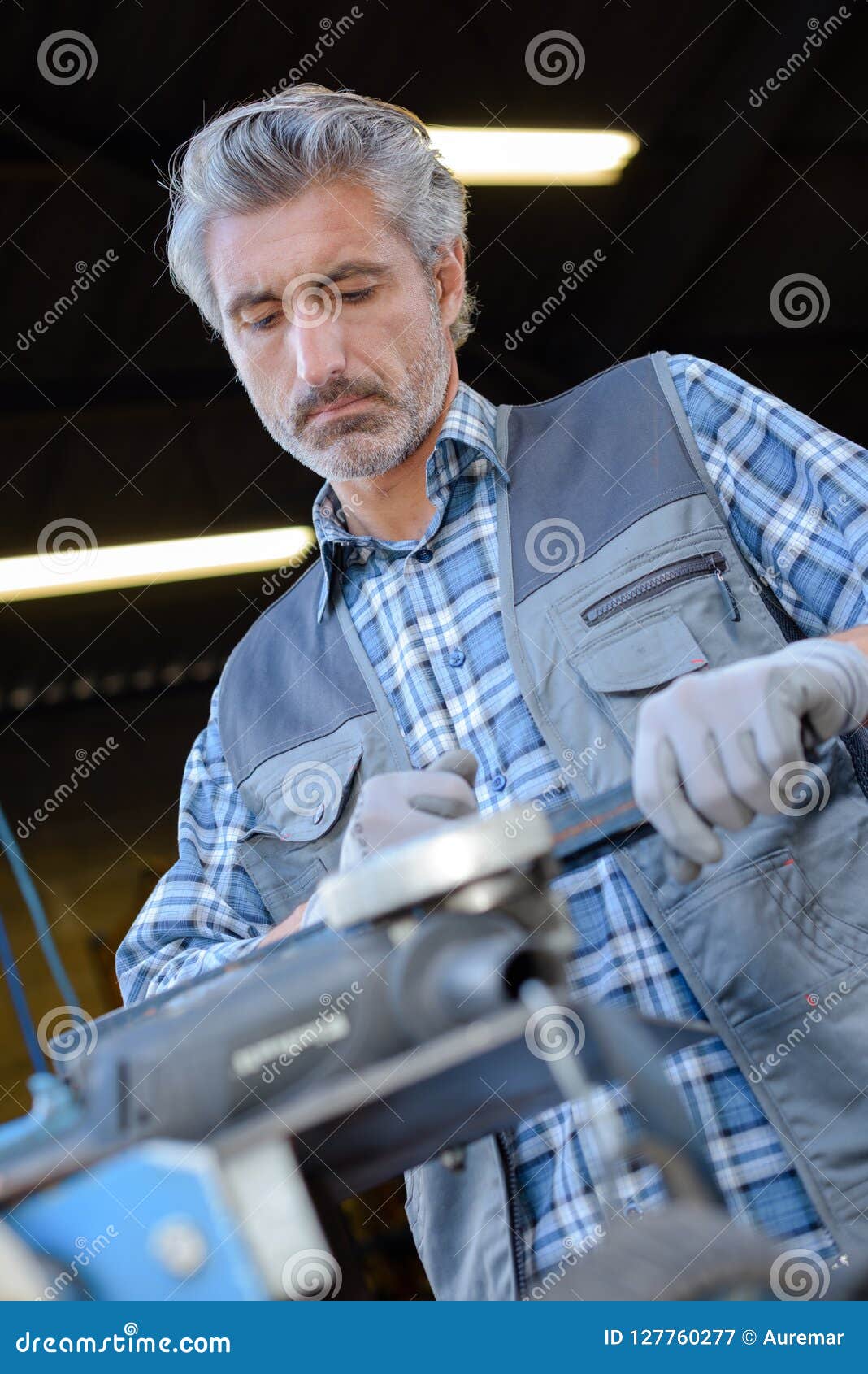 Worker doing his job stock image. Image of artisan, laborer - 127760277