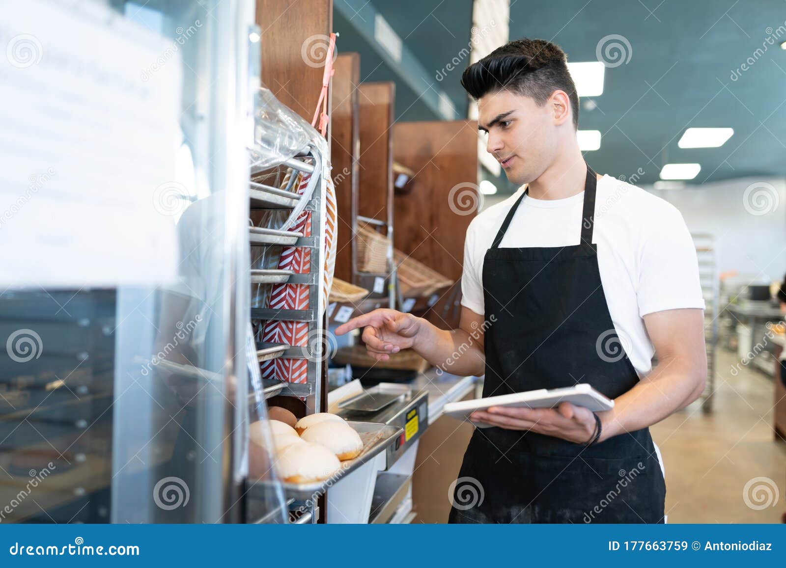 Worker Doing Inventory at a Bakery Stock Image - Image of worker ...