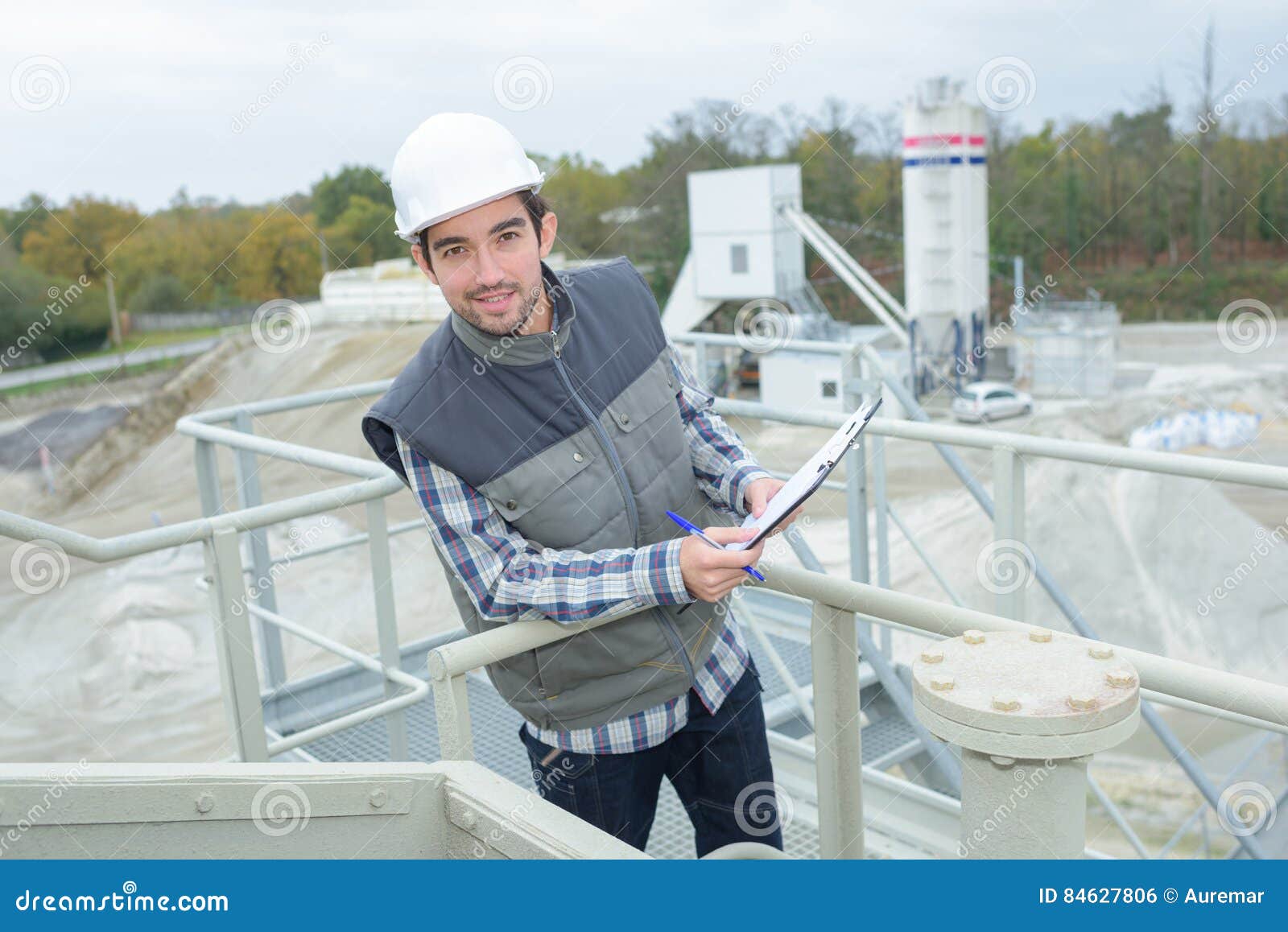 Worker Doing Safety Checks on Top Silos Factory Stock Photo - Image of ...
