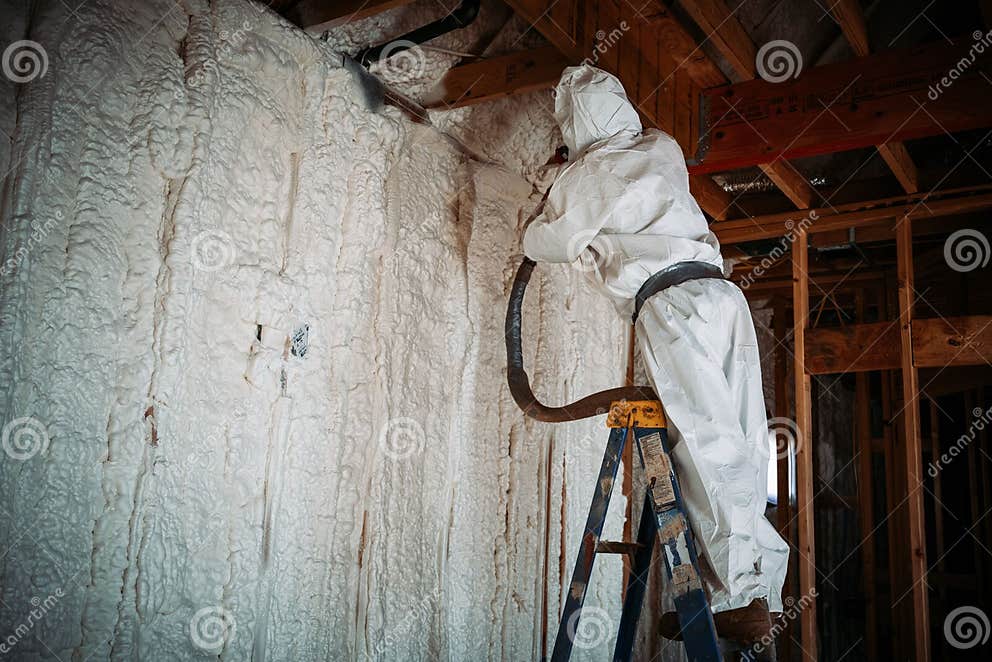 Worker Doing Spray Foam Insulation on the Walls Stock Photo - Image of ...