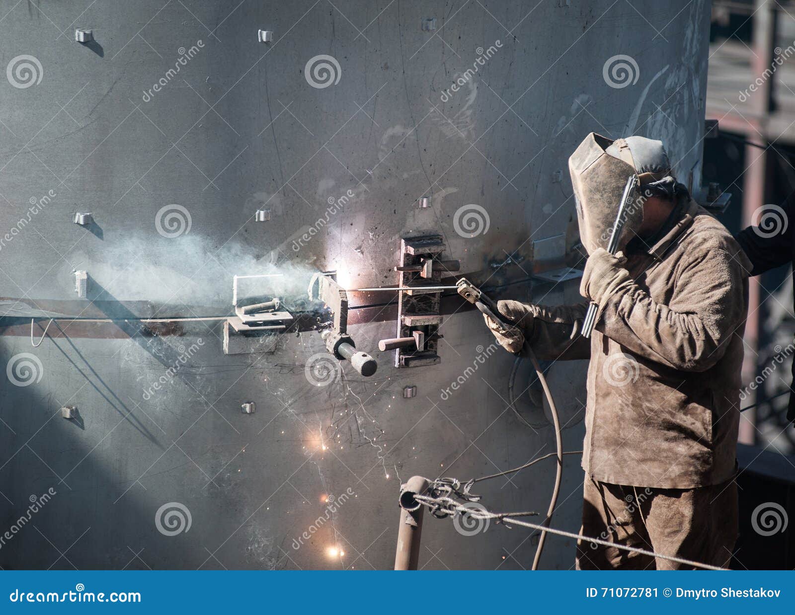 Worker while Doing a Welding Outdoor Stock Image - Image of mask ...