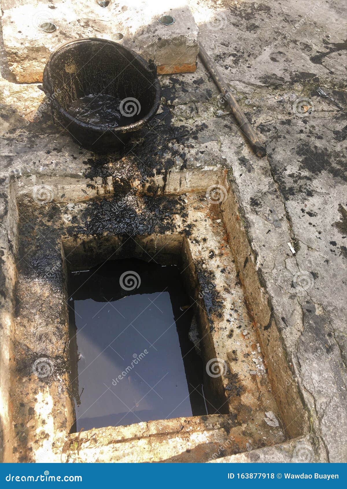 Worker Drain Operation Cleaning Dredging Drain Tunnel Cleaning in the ...