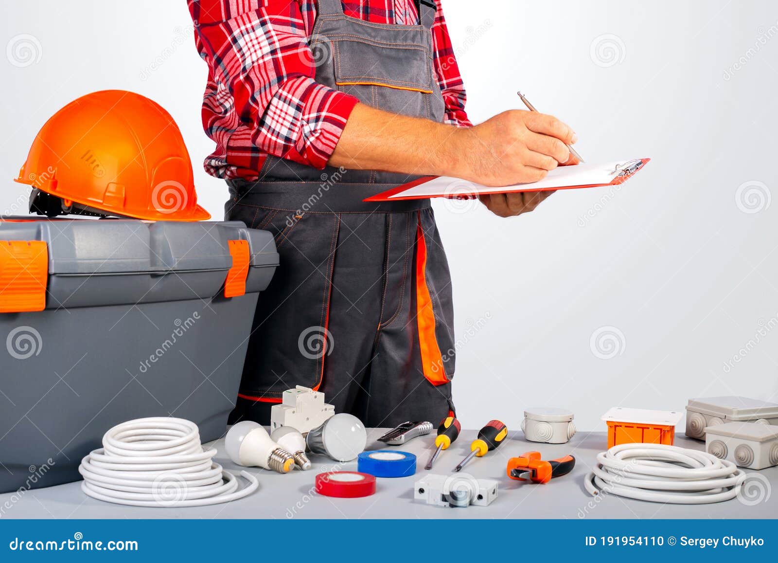 Worker Draws Up a Work Plan. Electrician. Stock Photo - Image of ...