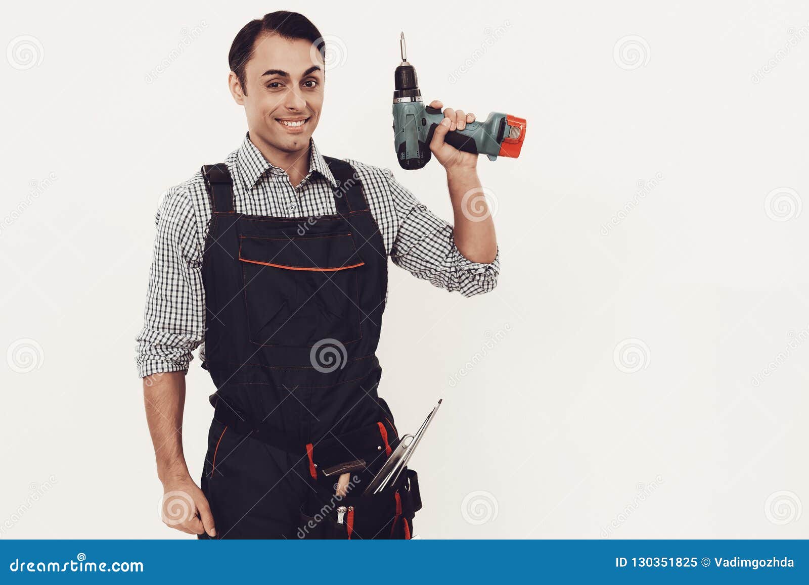 Worker with Drill in Hand on White Background. Stock Image - Image of ...