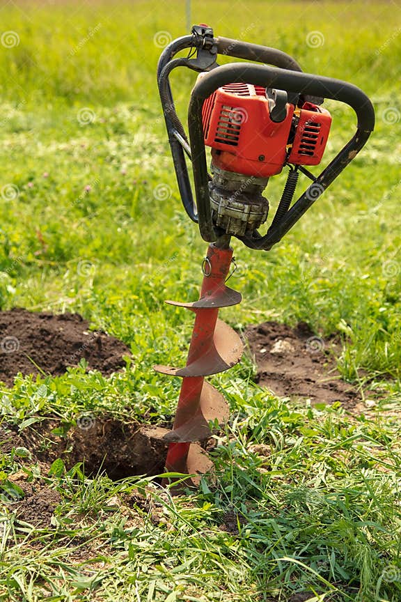 Worker Drills the Ground at the Construction Site Stock Photo - Image ...