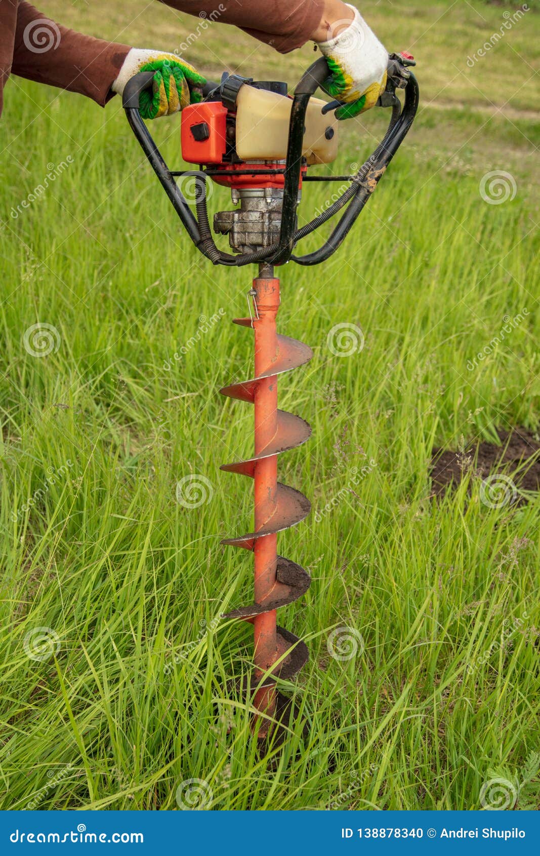 Worker Drills the Ground at the Construction Site Stock Photo - Image ...