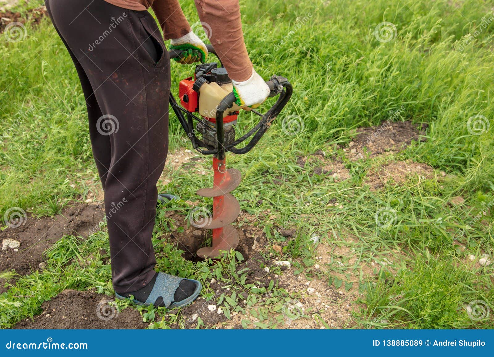 Worker Drills the Ground at the Construction Site Stock Image - Image ...