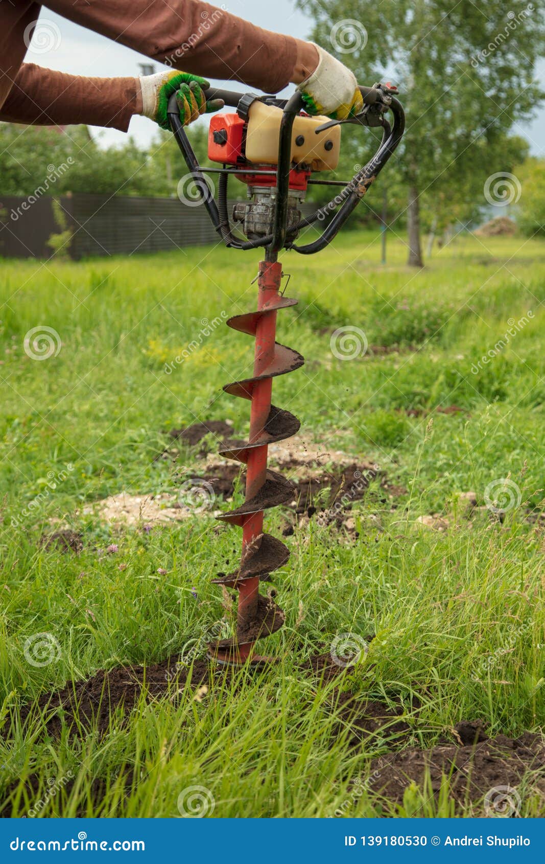 Worker Drills the Ground at the Construction Site Stock Photo - Image ...