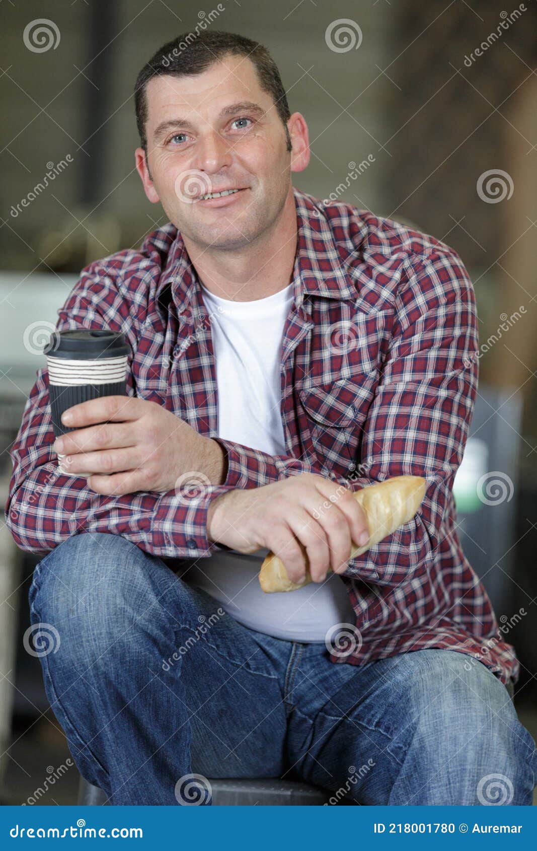 Worker Drinking Coffee and Resting Sitting in Factory Stock Photo ...