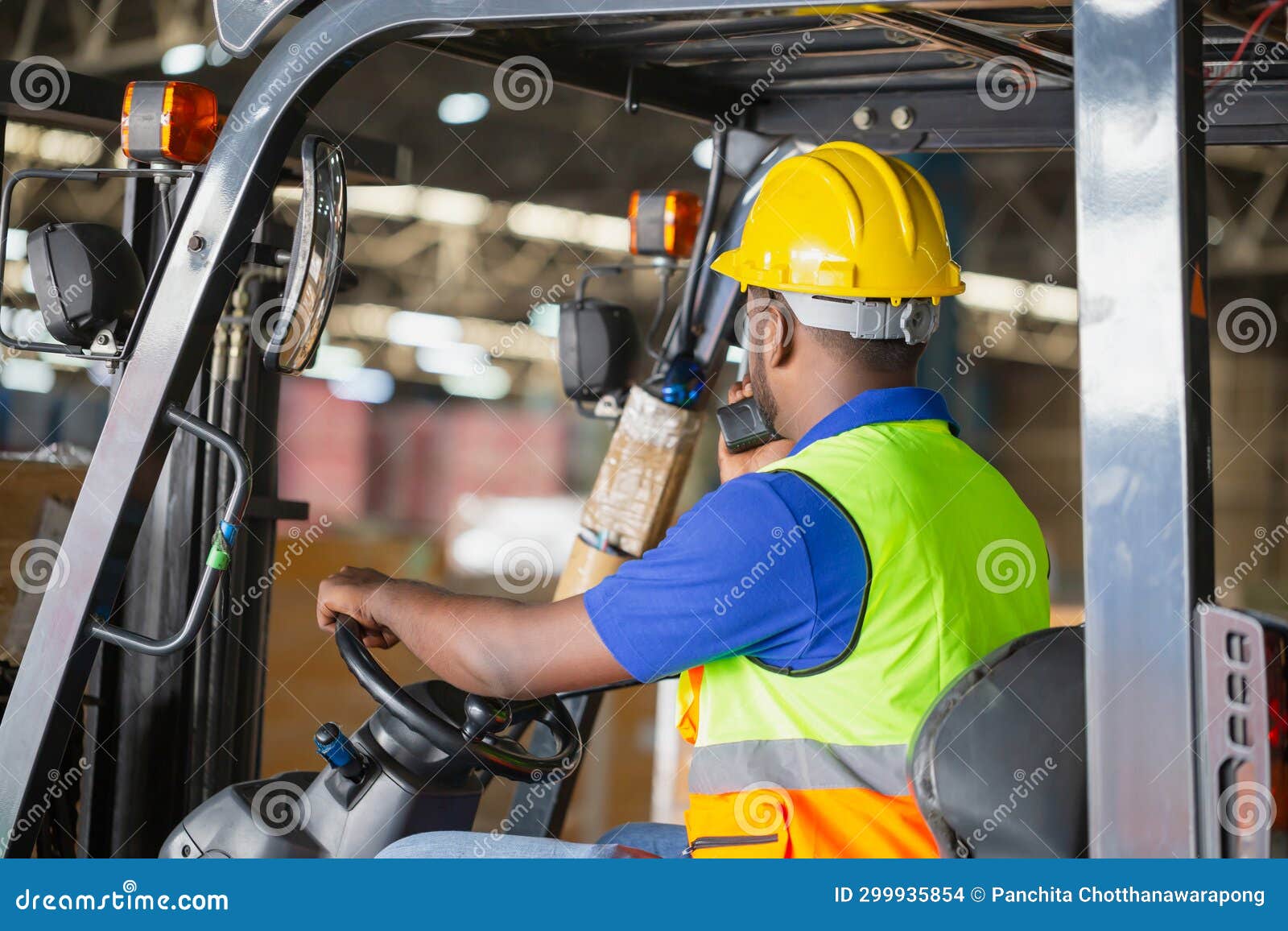 Worker Driver at Warehouse Forklift Loader Works To Containers Box ...