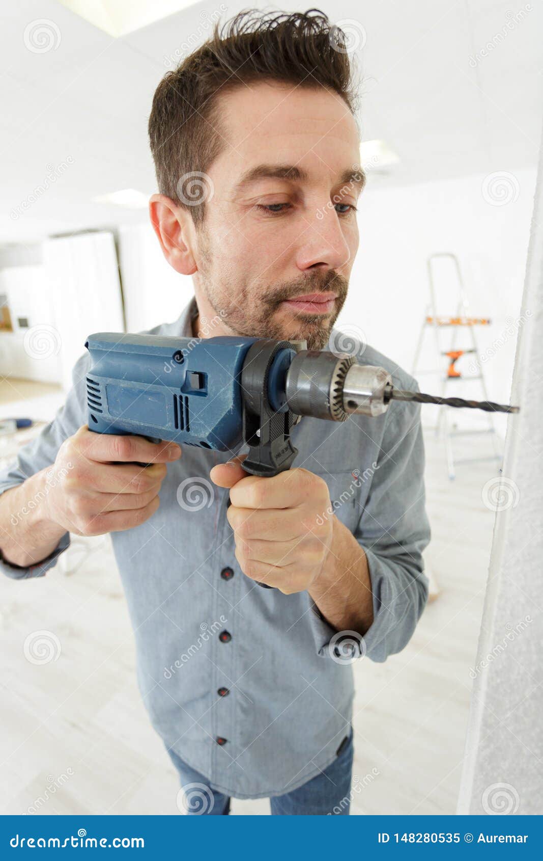 Worker with Electric Drill in Hand Stock Image - Image of drilling ...