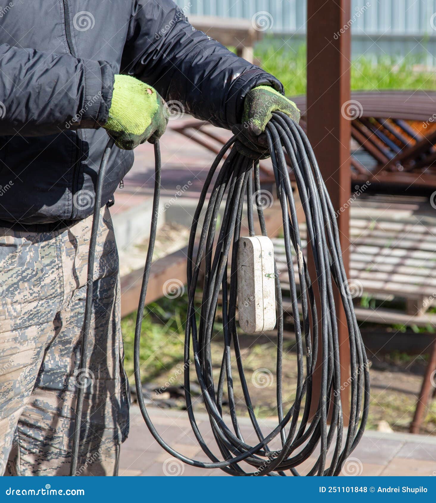 Worker with an Electric Wire in His Hands Stock Photo - Image of ...