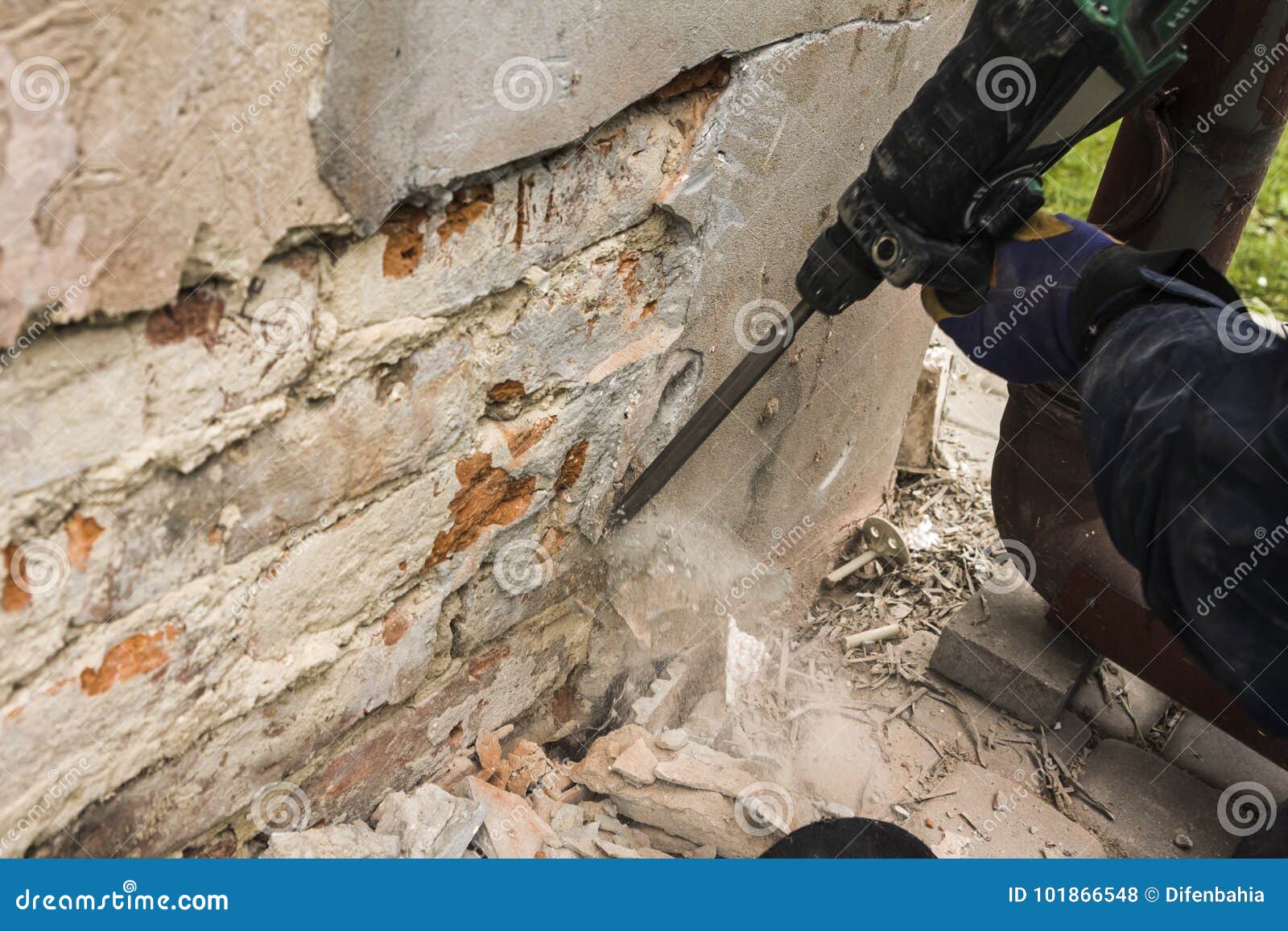 Worker with Electrical Hammer Cleaning Red Brick Wall Stock Photo ...