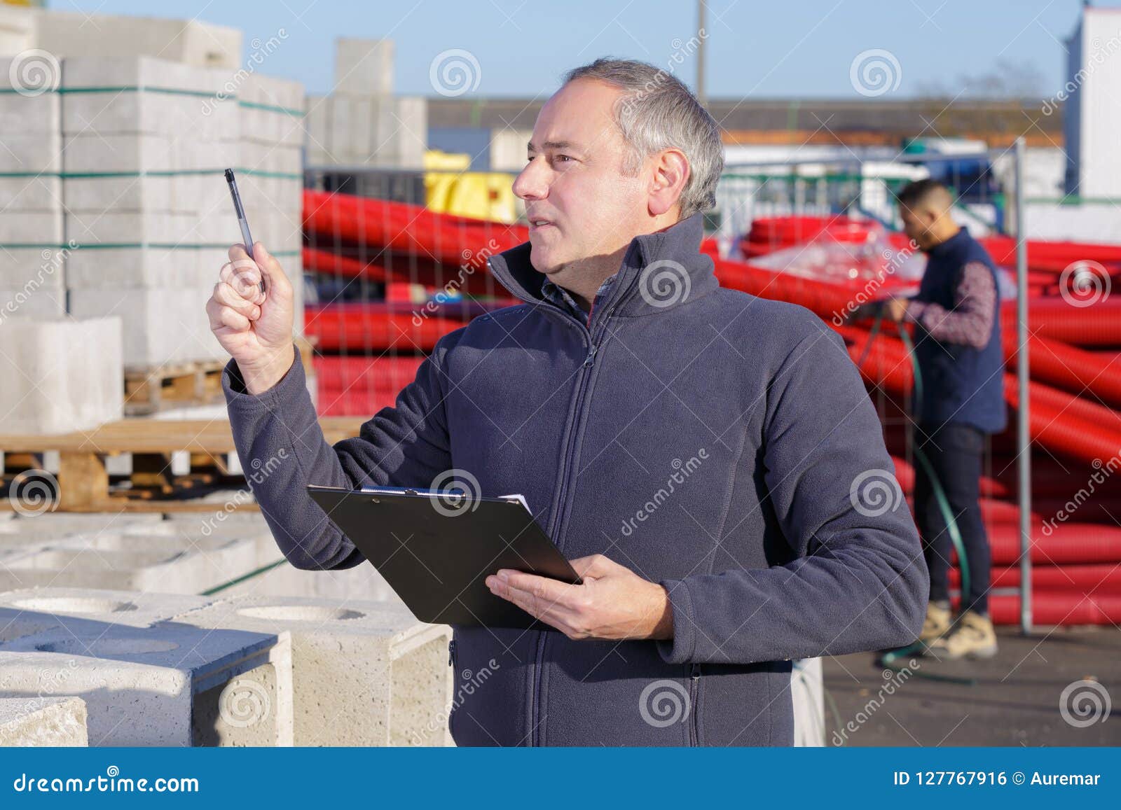 Worker Engineer Pointing at Construction Stock Photo - Image of outside ...