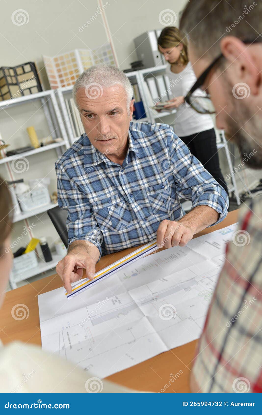 Worker Explaing Choices To Client Stock Photo - Image of curious ...