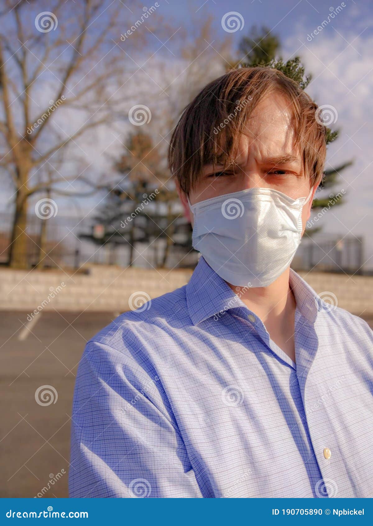 Worker in Facemask, Exhausted but Determined To Push Onward Stock Photo ...