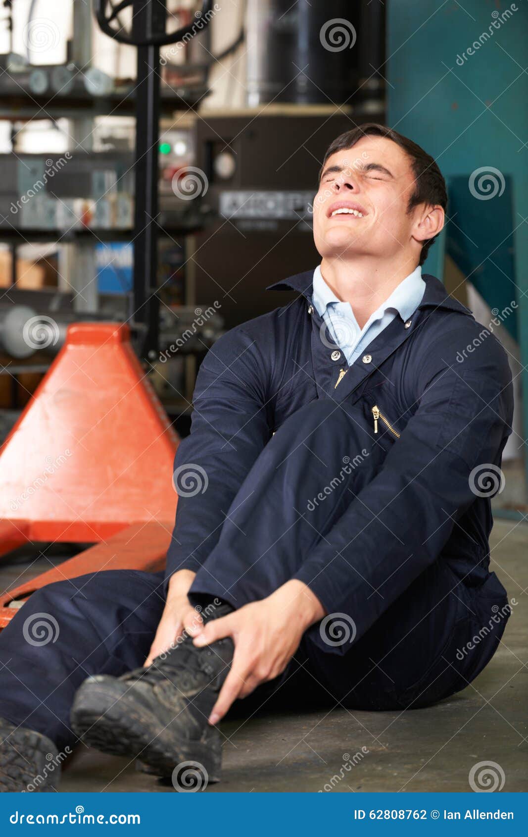 Worker in Factory Suffering Accident Stock Photo - Image of person ...