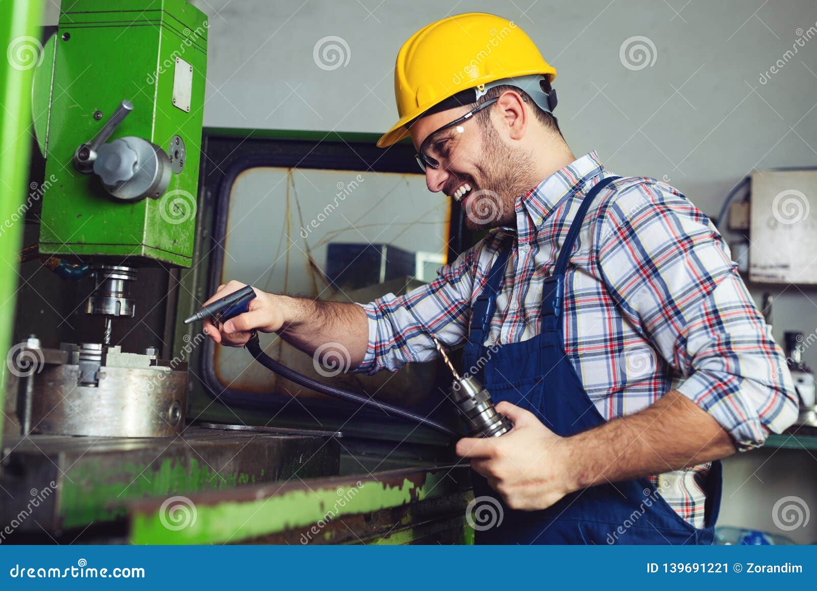 Worker in Factory Using Drill Machine Stock Image - Image of engineer ...