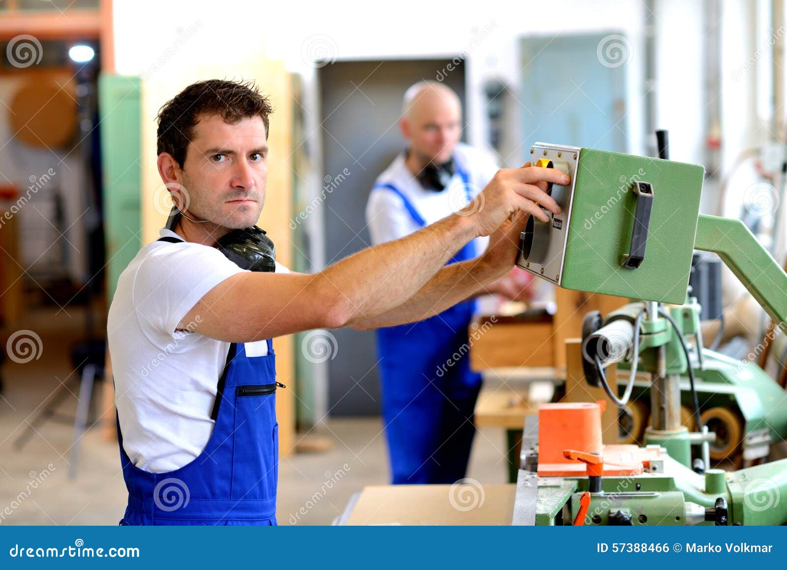 Worker in Factory Using Machine Stock Photo - Image of engineer ...