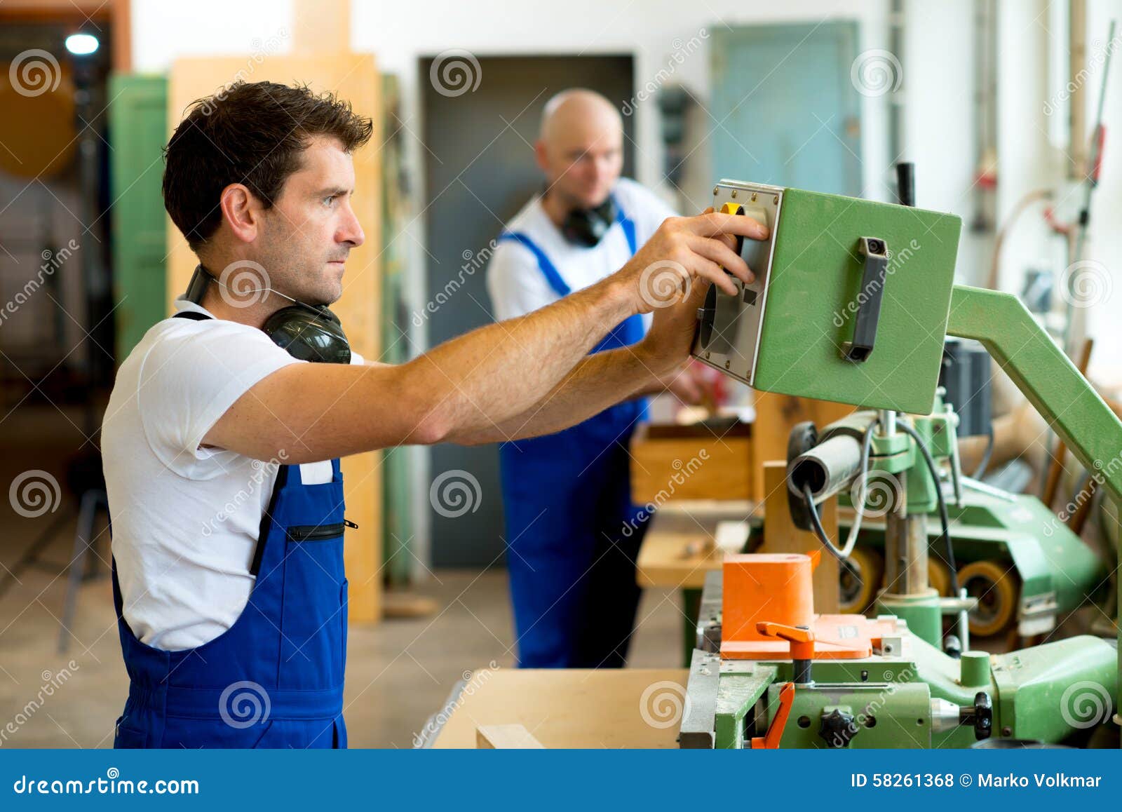 Worker in Factory Using Machine Stock Photo - Image of joinery ...