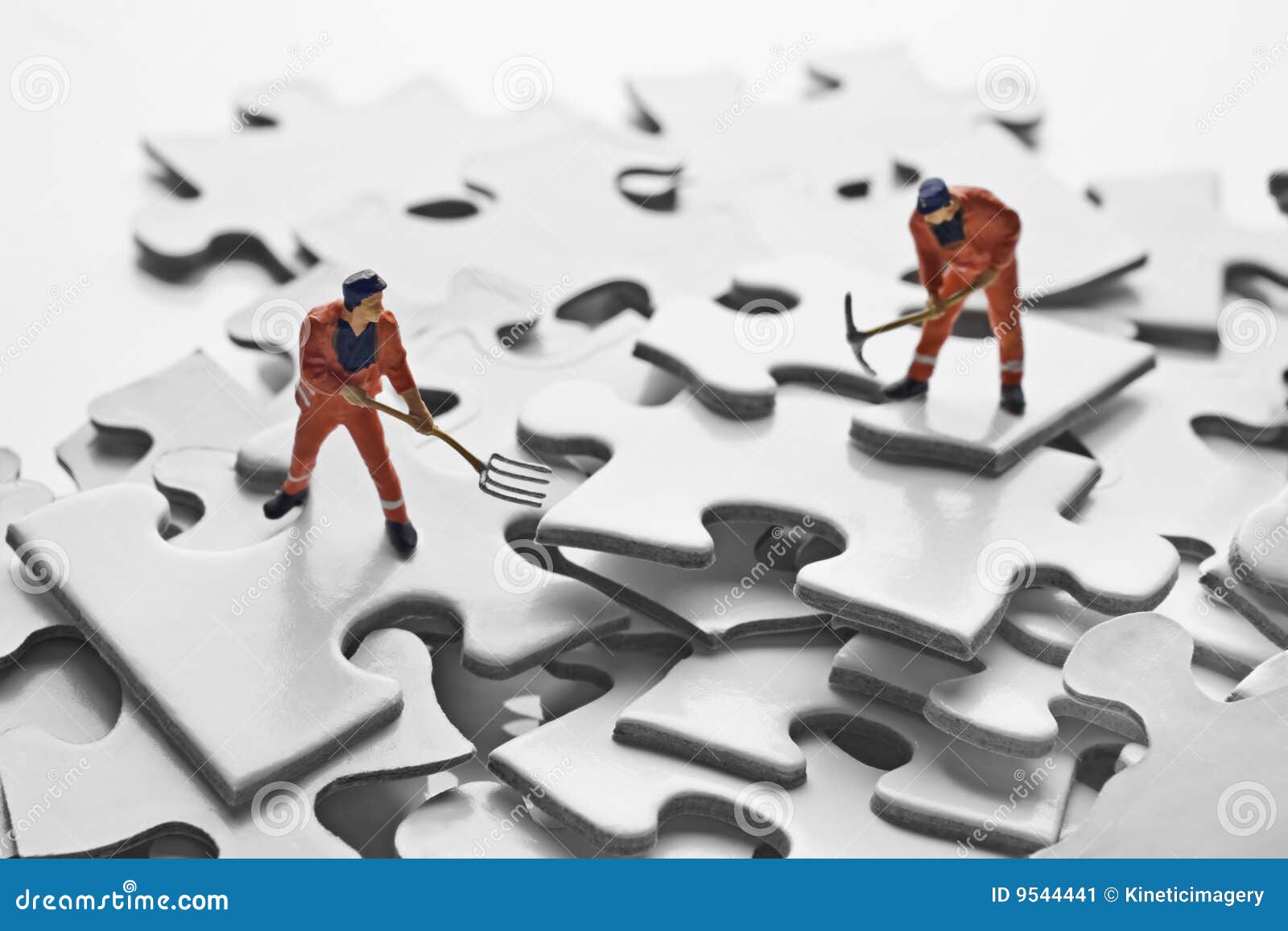 Worker Figurine on Puzzle Pieces Stock Image - Image of build, pick ...