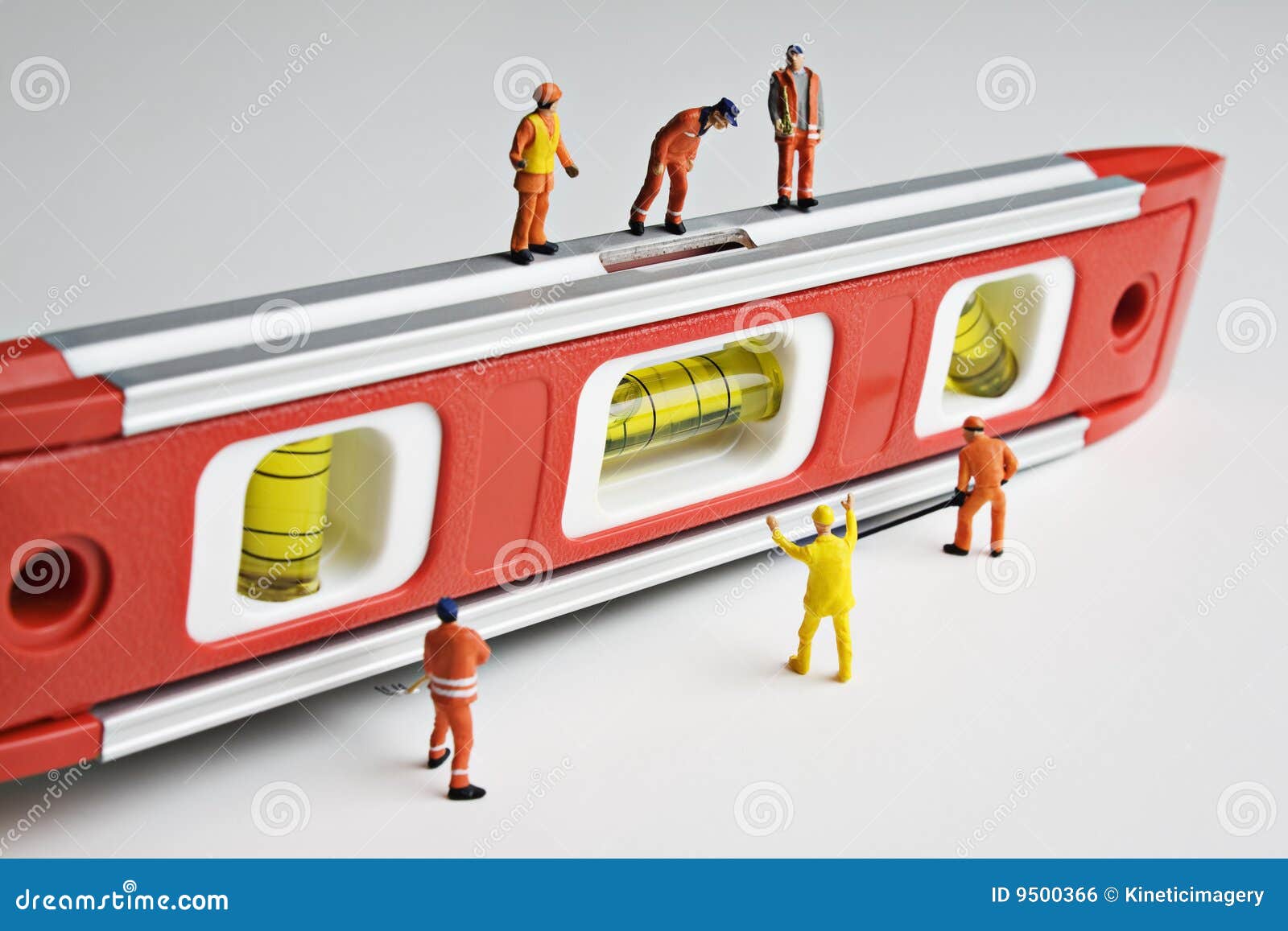 Worker Figurines and a Level Stock Photo - Image of figurine, work: 9500366
