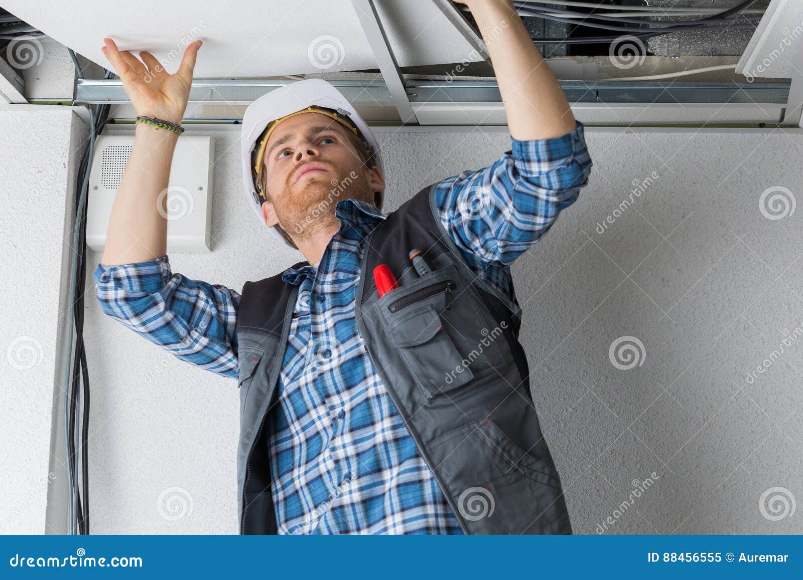 Worker Fitting Panel into Frame Suspended Ceiling Stock Image - Image ...