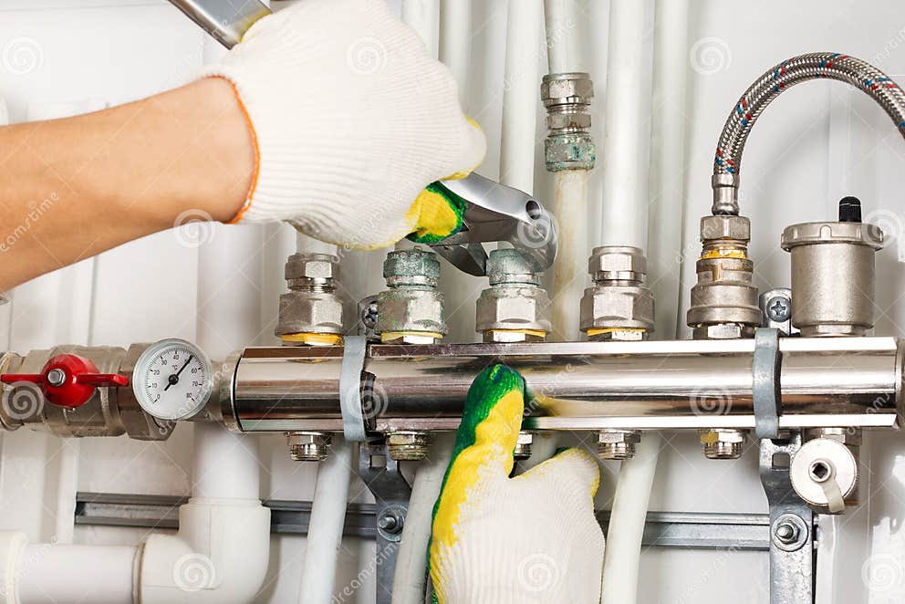 Worker Fixing Heating System Stock Image - Image of construction, pipe ...