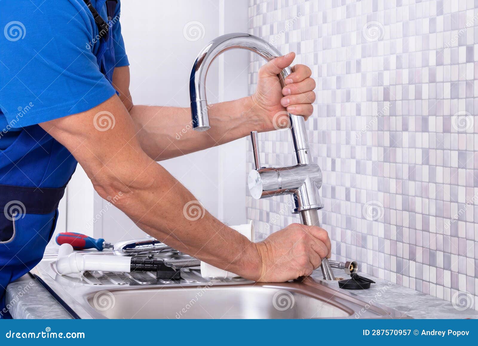Worker Fixing Water Tap stock image. Image of services - 287570957