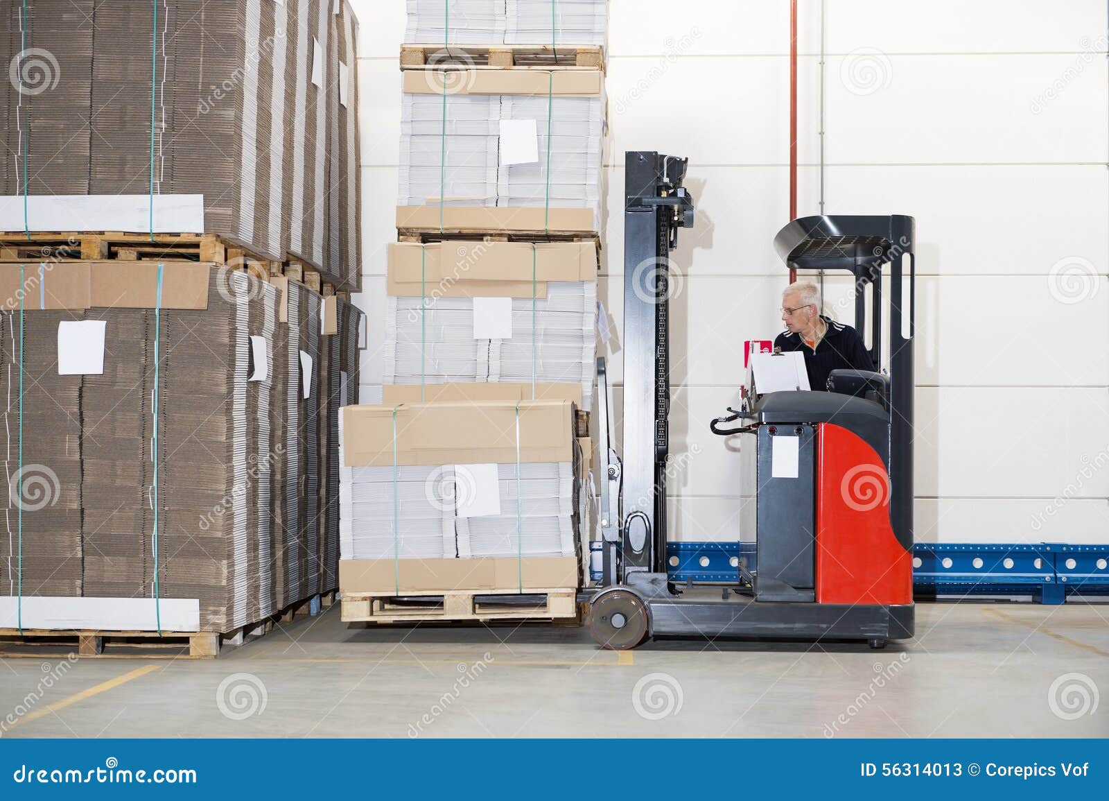 Worker in Forklift Examining Stockpile Stock Image - Image of system ...