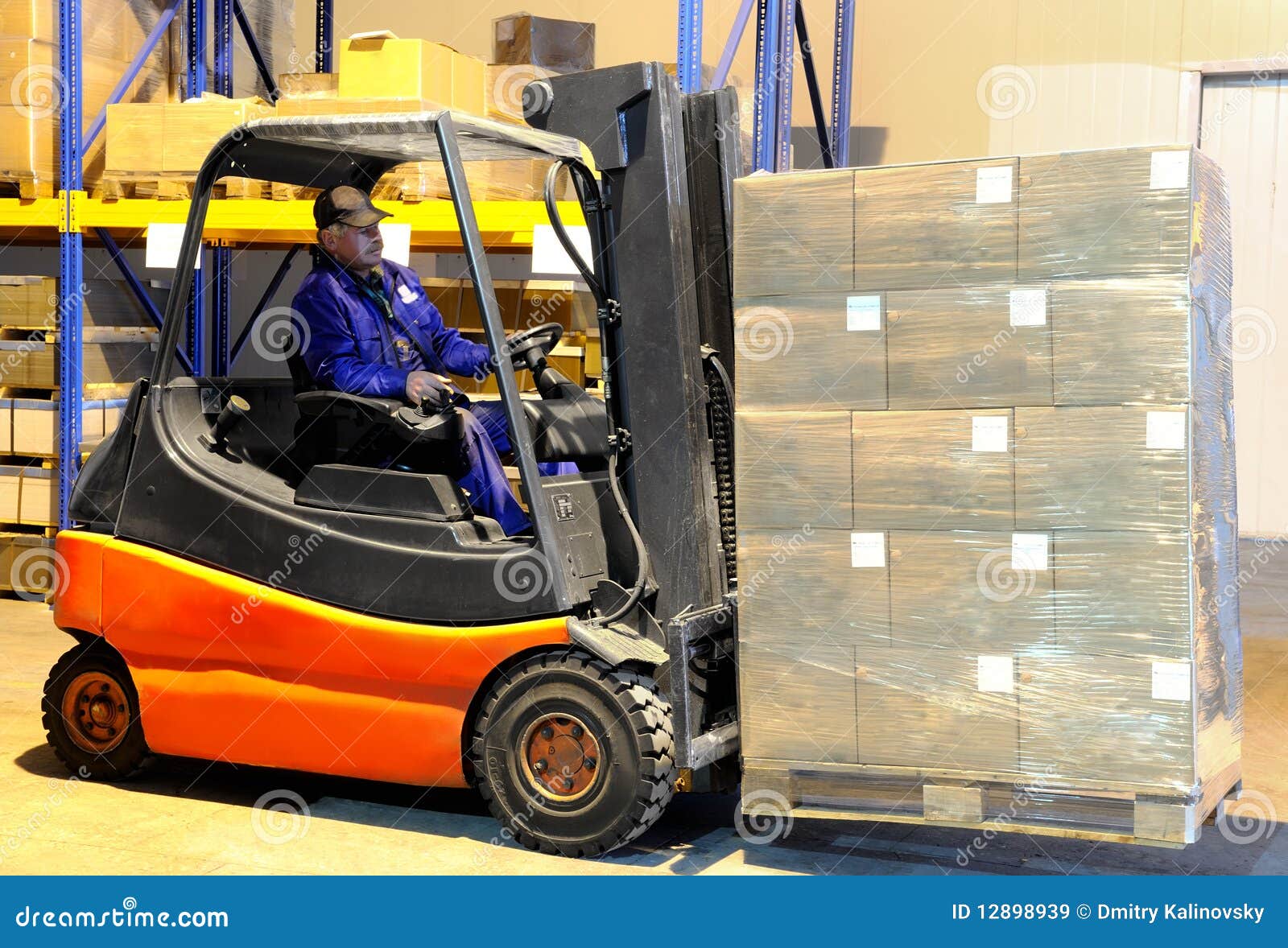 Worker and Forklift Loader at Stock Image - Image of electric, loading ...