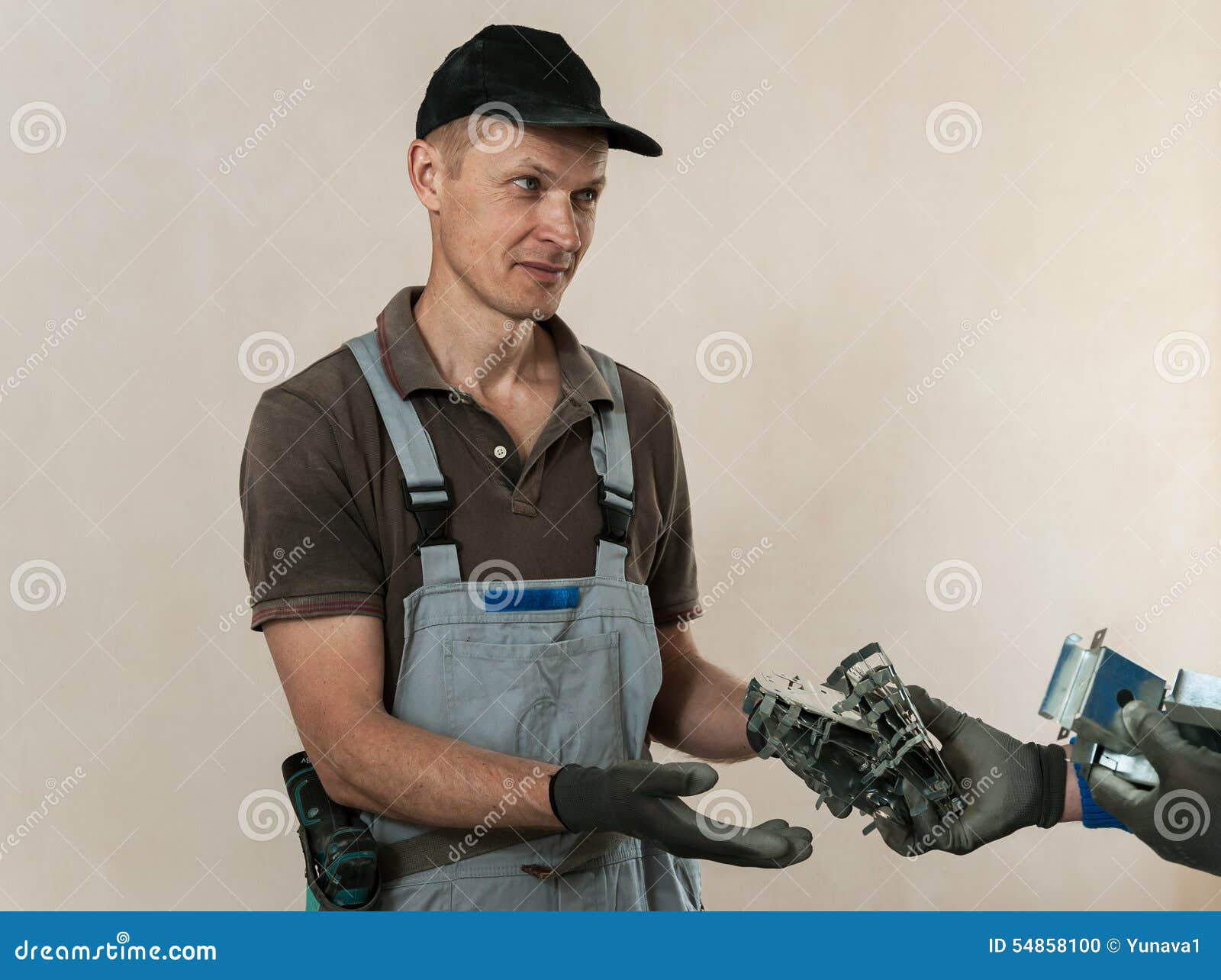 Worker Gets the Items for Assembling Metal Frame Stock Photo - Image of ...