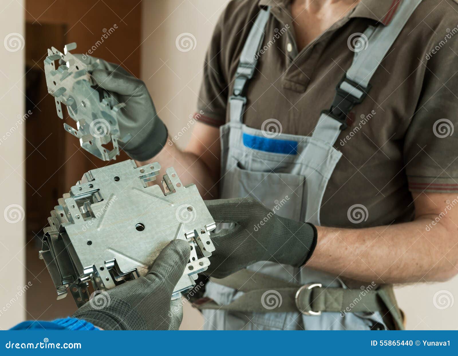 Worker Gets the Items for Assembling Metal Frame Stock Photo - Image of ...