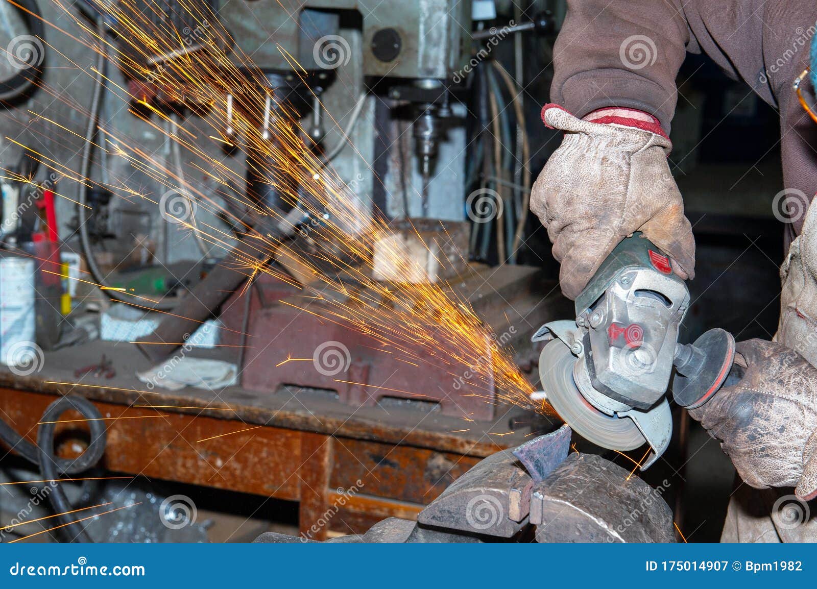 Worker Grinding Cutting Metal Sheet with Grinder Machine Stock Image ...