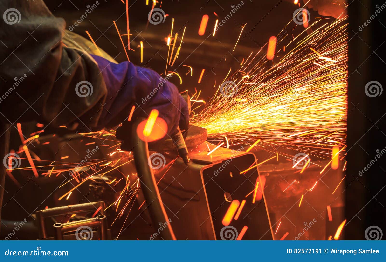 The worker grinding metal stock image. Image of labor - 82572191