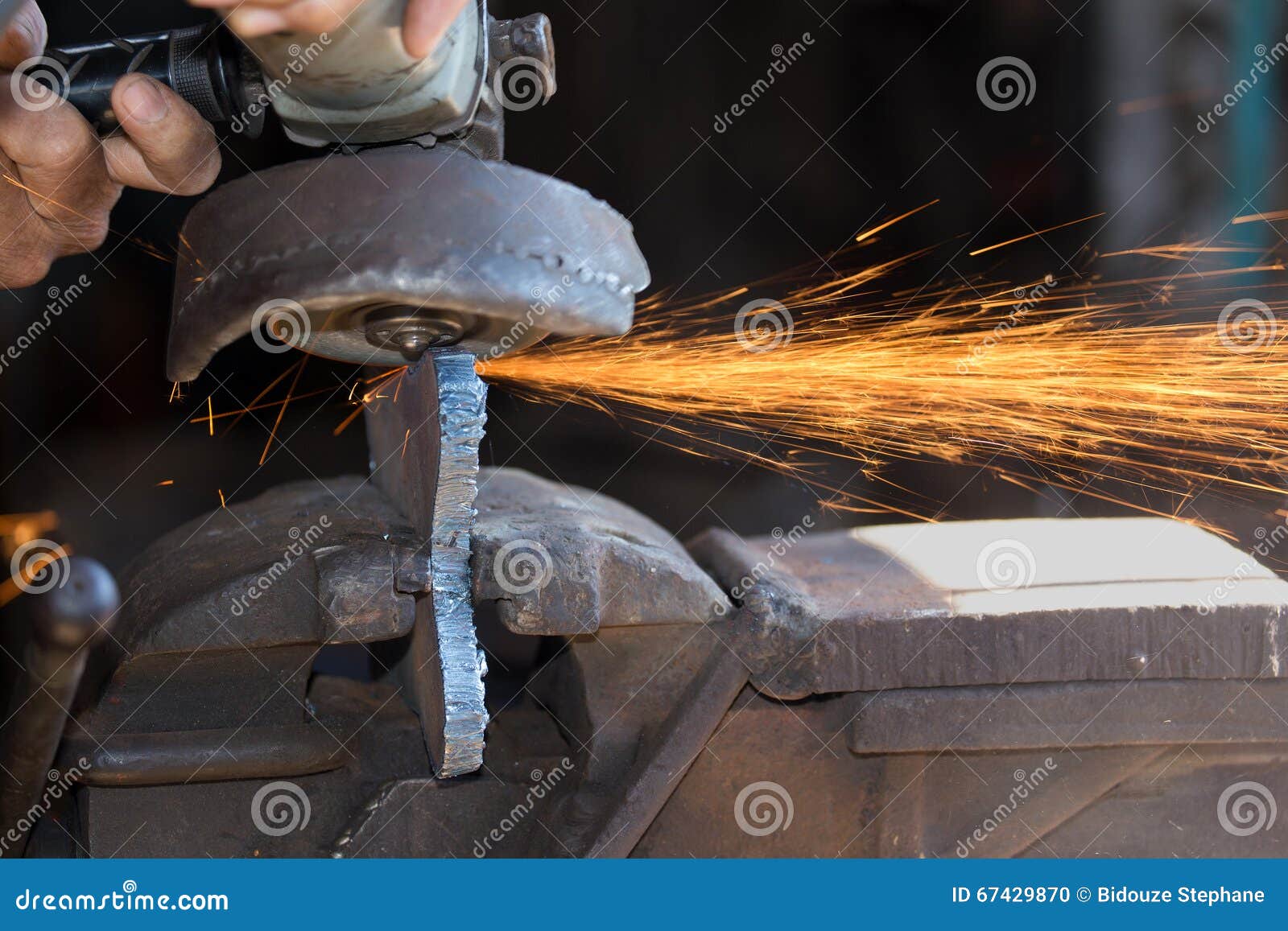 Worker Grinding a Metal Part Stock Photo - Image of flash, industry ...