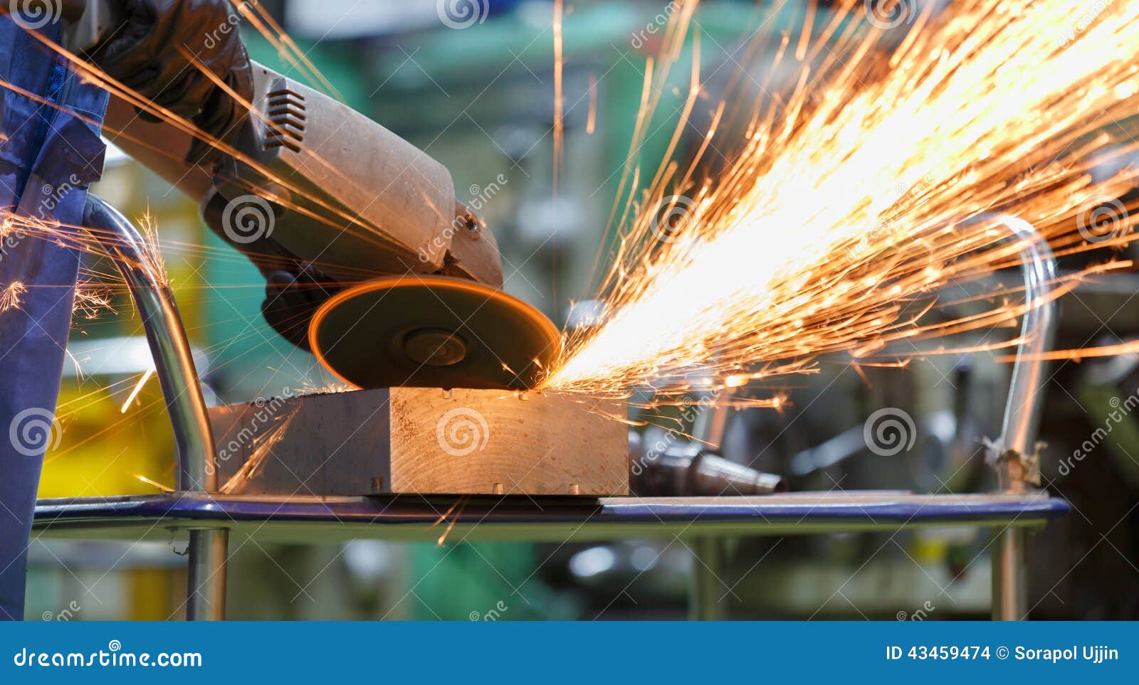 Worker Grinding Steel by Electric Grinding Machine Stock Photo - Image ...