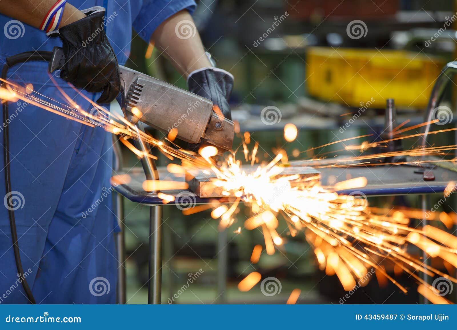 Worker Grinding Steel by Electric Grinding Machine Stock Image - Image ...