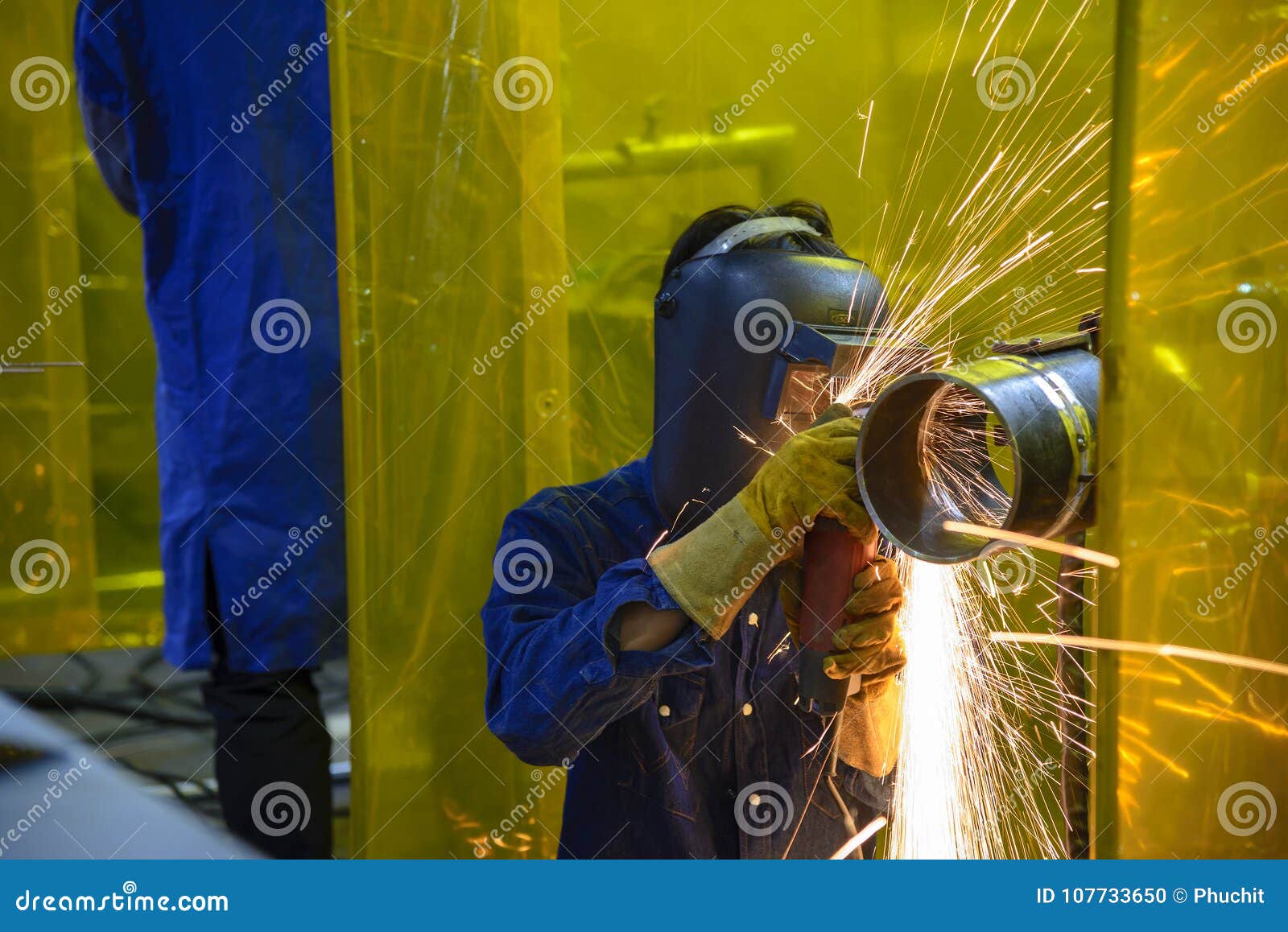 The Worker Grinding the Steel Pipe after Welding Stock Photo - Image of ...