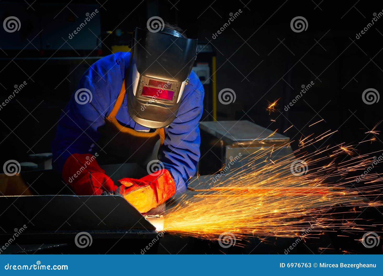 Worker grinding/welding stock image. Image of factory - 6976763