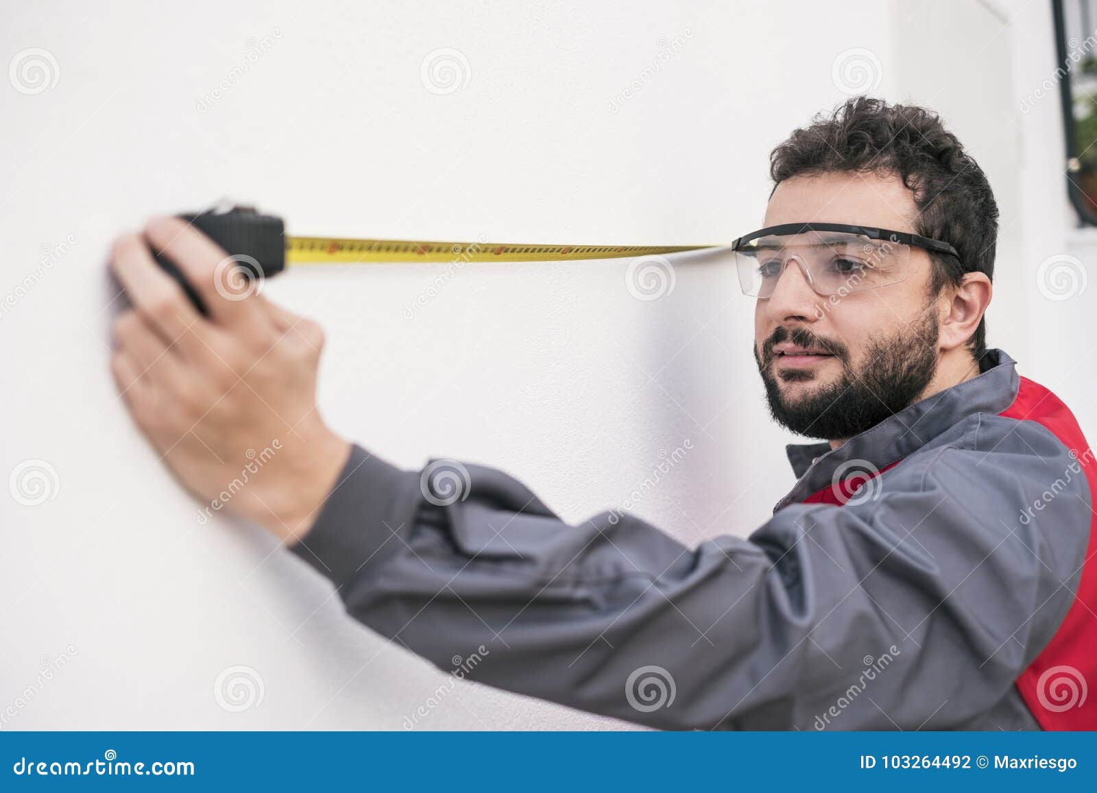 The worker guy measuring stock photo. Image of eastern - 103264492